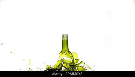 Bottle of White Wine Breaking and Splashing against White Background ...