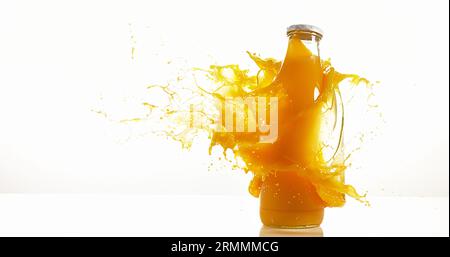 Bottle of Orange Exploding against White Background Stock Photo - Alamy