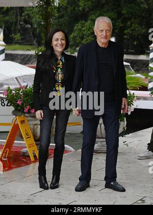 Santo Versace and wife Francesca De Stefano arrives to pay his respects ...