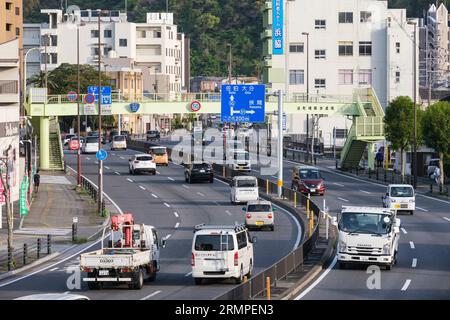 Japan, Kyushu, Beppu. Late Afternoon Traffic on National Route 10 ...