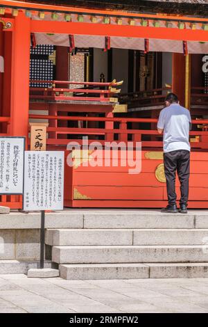 Japan, Kyushu. Worshipper Praying at the Usa Jingu Shinto Shrine, Japan ...