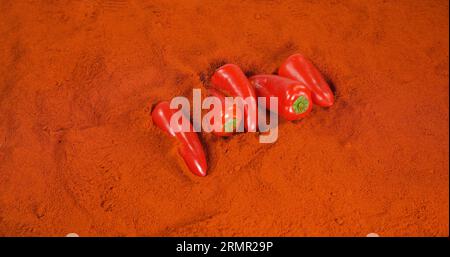 Paprika, capsicum annuum, falling on Paprika Powder Stock Photo - Alamy