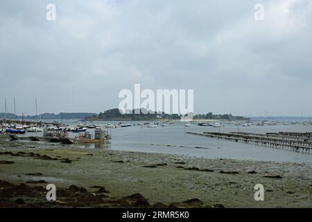 View across Anse du Logeo and oyster beds at low tide from Le Logeo ...