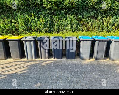 Overflowing garbage cans in parking lots. Too much garbage on the ...
