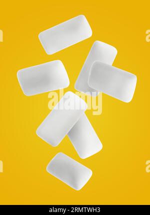 Many chewing gum pads falling on pink background Stock Photo - Alamy