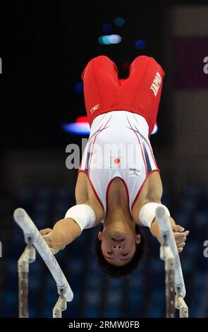 Yuya Kamoto of Japan during parallel bars for men at the 49th FIG ...