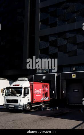 Side view of a Coca Cola red and white delivery truck. Parked on the ...