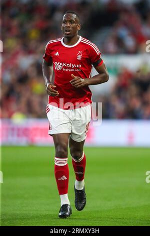 Willy Boly #30 of Nottingham Forest tackles Neal Maupay #7 of Brentford ...
