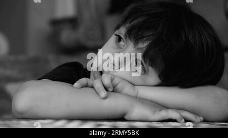Monochrome Portrait of Forlorn Boy, Overwhelmed by Gloom and Boredom ...