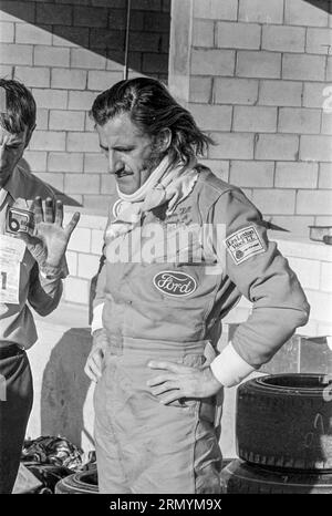 Graham Hill in the pits driving a Brabham BT34 at the 1971 Watkins Glen ...