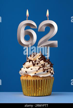 Vertical birthday card with number 62 candle - Green background with ...
