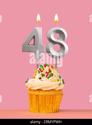 Vertical birthday card with number 48 candle - Green background with ...