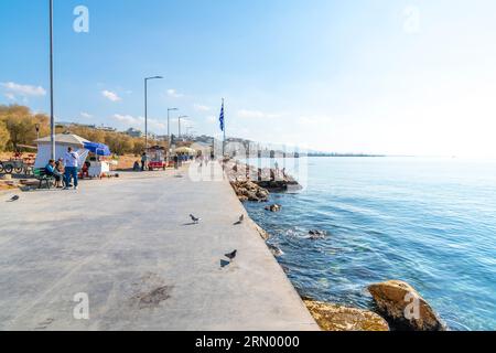 The seafront pedestrian boardwalk and promenade along the Athenian ...