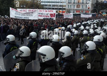 People attend a student-led march marking one year since a physically ...