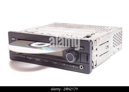 Old car radio with cd disk isolated on white background Stock Photo - Alamy