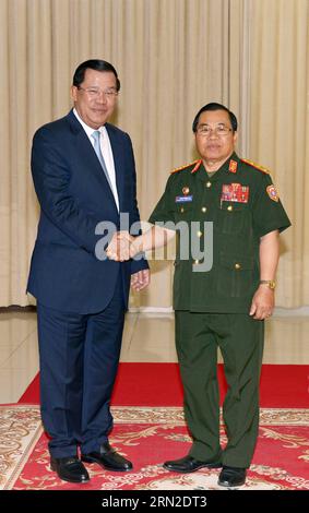Visiting Prime Minister Lt. Gen. Soe Win of Myanmar, center ...