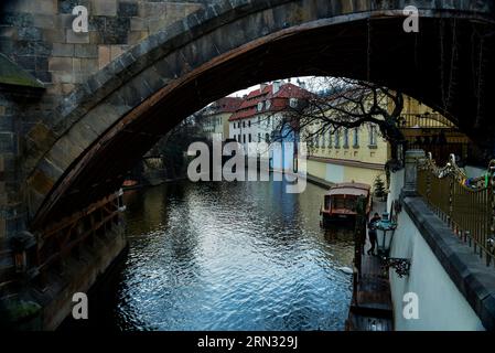 Arch of Charles Bridge over Devil's Channel in Prague, Czech Republic ...