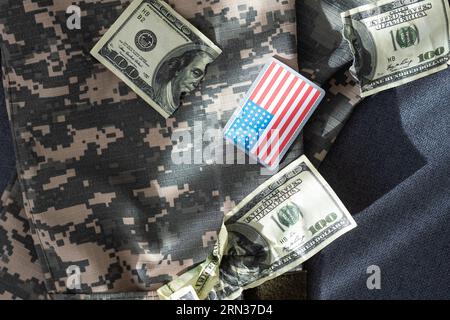 USA flag and money. Cash for VA loan from U.S. Department of Veterans ...