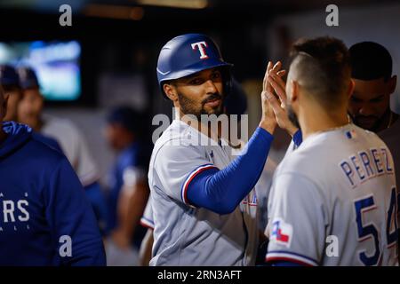 Texas Rangers' Marcus Semien celebrates after hitting a home run ...