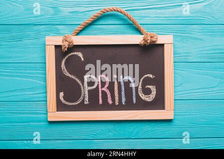 Blackboard with spring writing Stock Photo - Alamy