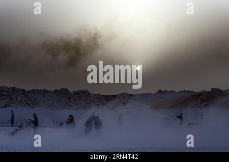 (150530) -- MINYA, - Egyptian quarry workers are seen working beside ...