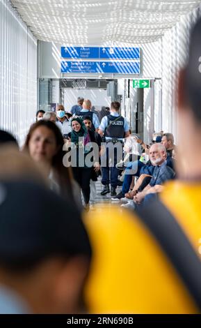 Police and people at Munich Airport, Bavaria, Germany Stock Photo - Alamy