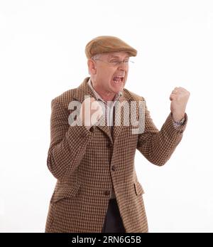 A mature Englishman in classic tweeds smoking a large cigar Stock Photo ...