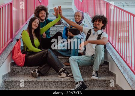 A diverse group of students symbolizes unity as they interlace their ...