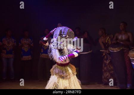 Zimbabwean dancers perform traditional Makishi dance at Old Mutual ...