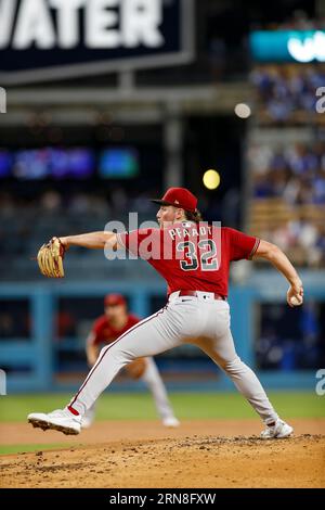 Arizona Diamondbacks starting pitcher Brandon Pfaadt warms up during ...