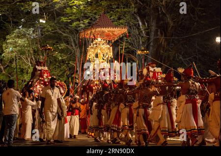 Kandy, Homagama, Sri Lanka. 30th Aug, 2023. A fire spinner takes part ...