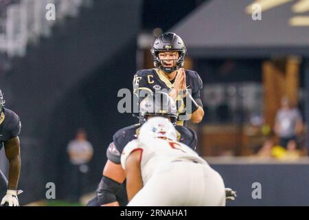 Wake Forest quarterback Mitch Griffis (12) celebrates his touchdown ...