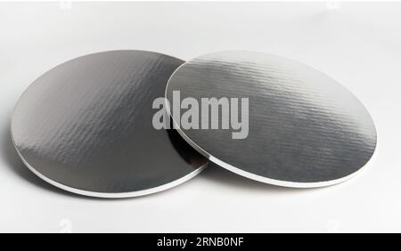 Silver plastic round tray isolated over white background, confectionery ...