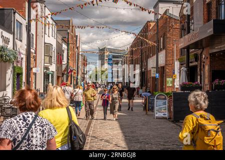 Shoppers and sightseers on trendy Humber Street in the City of Hull ...