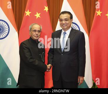 Indian President Pranab Mukherjee, left and president’s secretary Omita ...