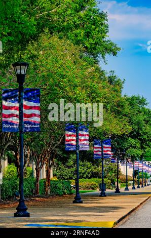 Welcome banners are posted in front of Foley City Hall, Aug. 19, 2023 ...