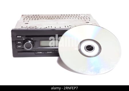 Old car radio with cd disk isolated on white background Stock Photo - Alamy