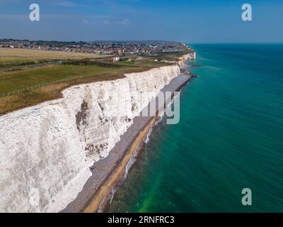 Aerial view of the chalk Telscombe Cliffs at Peacehaven, East Sussex ...