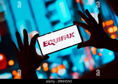 In this photo illustration, the Equifax logo is displayed on a ...
