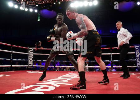 Samuel Antwi (left) strikes Mason Cartwright in the BBBofC British ...