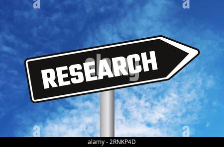 Research road sign on cloudy sky background Stock Photo - Alamy
