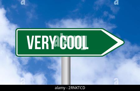 Very cool road sign on blue sky background Stock Photo - Alamy