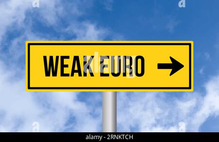 Weak euro road sign on blur background Stock Photo - Alamy