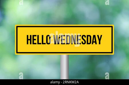Hello wednesday road sign on blue sky background Stock Photo - Alamy
