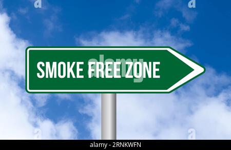 Smoke free zone road sign on sky background Stock Photo - Alamy