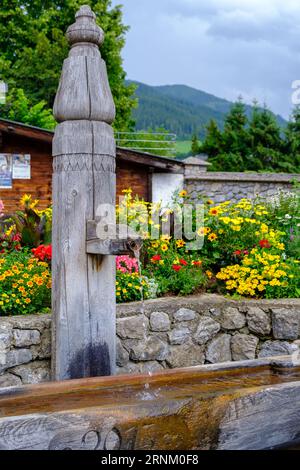 Traditional Alpine water trough in Murren ski resort, Switzerland Stock ...