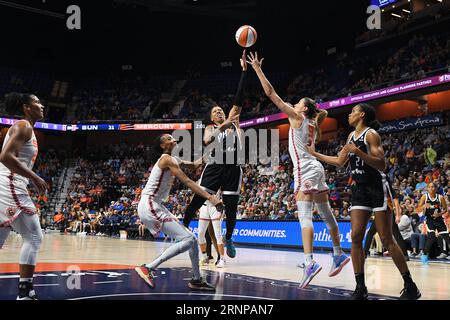 Connecticut Sun guard Rebecca Allen (9) and New York Liberty forward ...