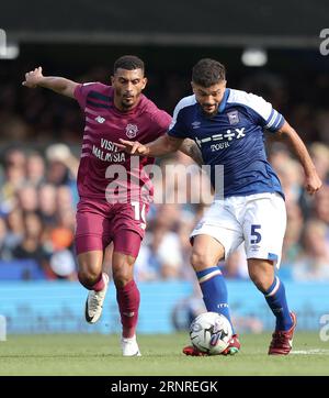 Ipswich Town's Sam Morsy (left) and Coventry City's Jay Dasilva battle ...