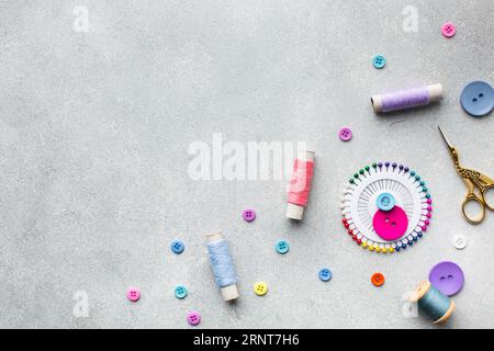 Arrangement colourful sewing threads buttons Stock Photo - Alamy