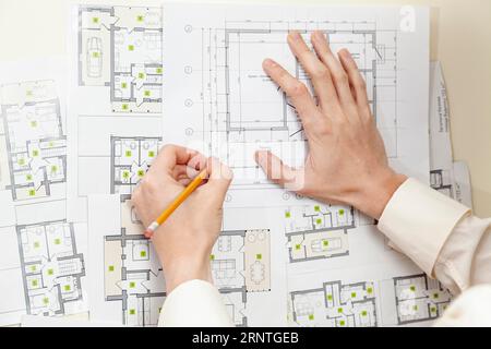 Top view architect making house project Stock Photo - Alamy